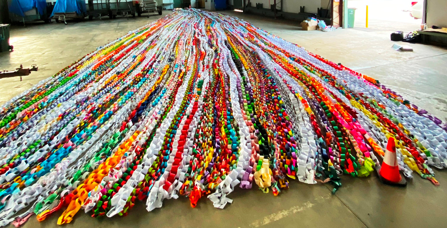Longest human made paper chain – Shopify.